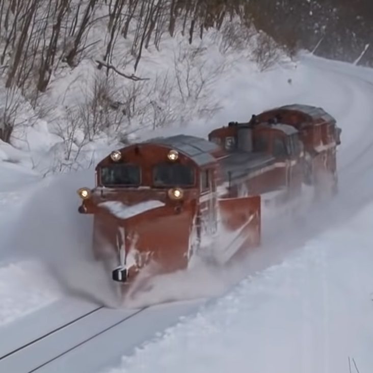 Spectacular footage of trains busting through white walls of snow | WWJD