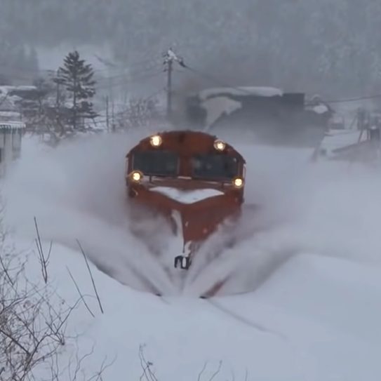 Spectacular footage of trains busting through white walls of snow | WWJD