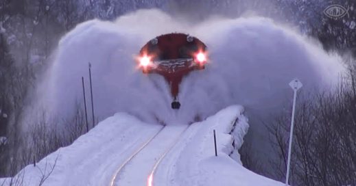 Spectacular footage of trains busting through white walls of snow | WWJD