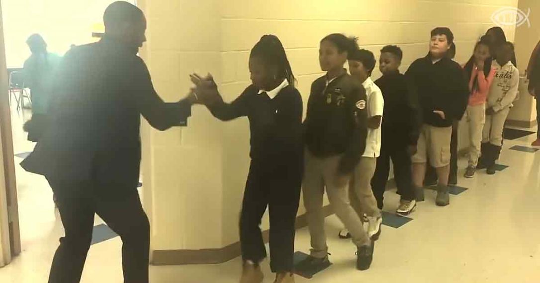 Teacher has a special handshake for each of his students. | WWJD
